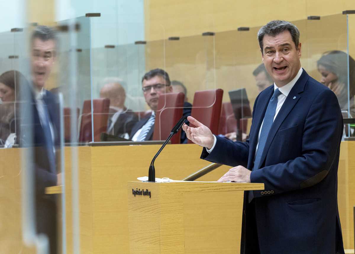 German states tighten virus rules as pandemic battle falters - MarketBeat