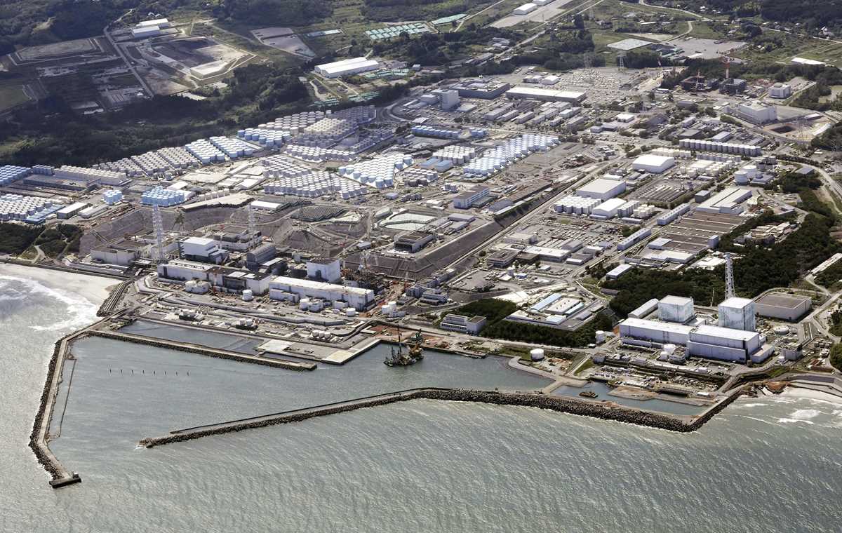 Japan's industry minister chides utility president over radioactive ...