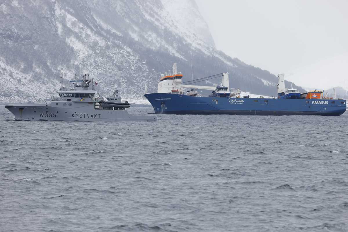 Salvage crews tow drifting Dutch freighter to port in Norway