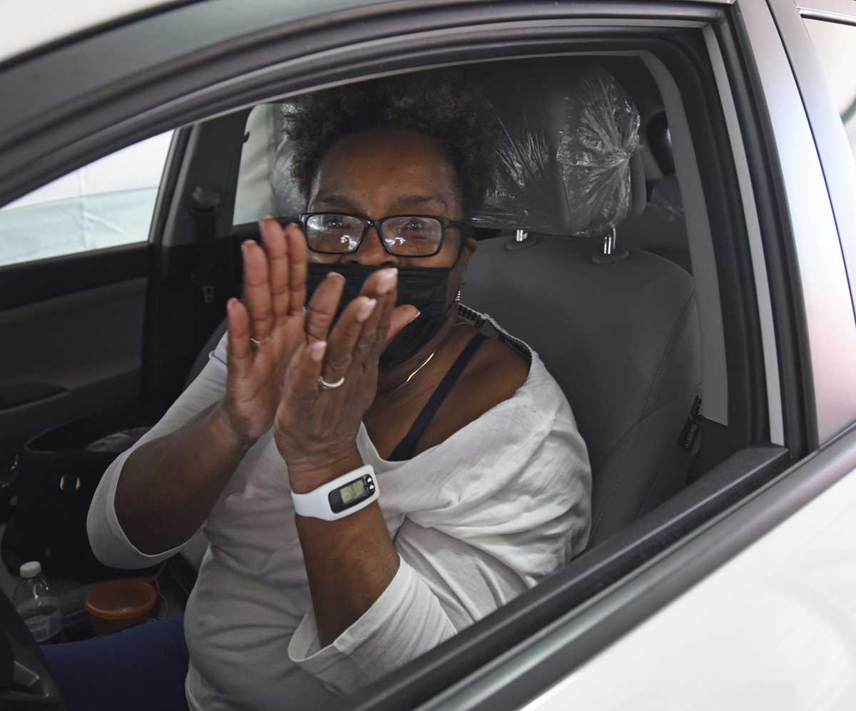 The Latest: Four former US presidents urge getting shots