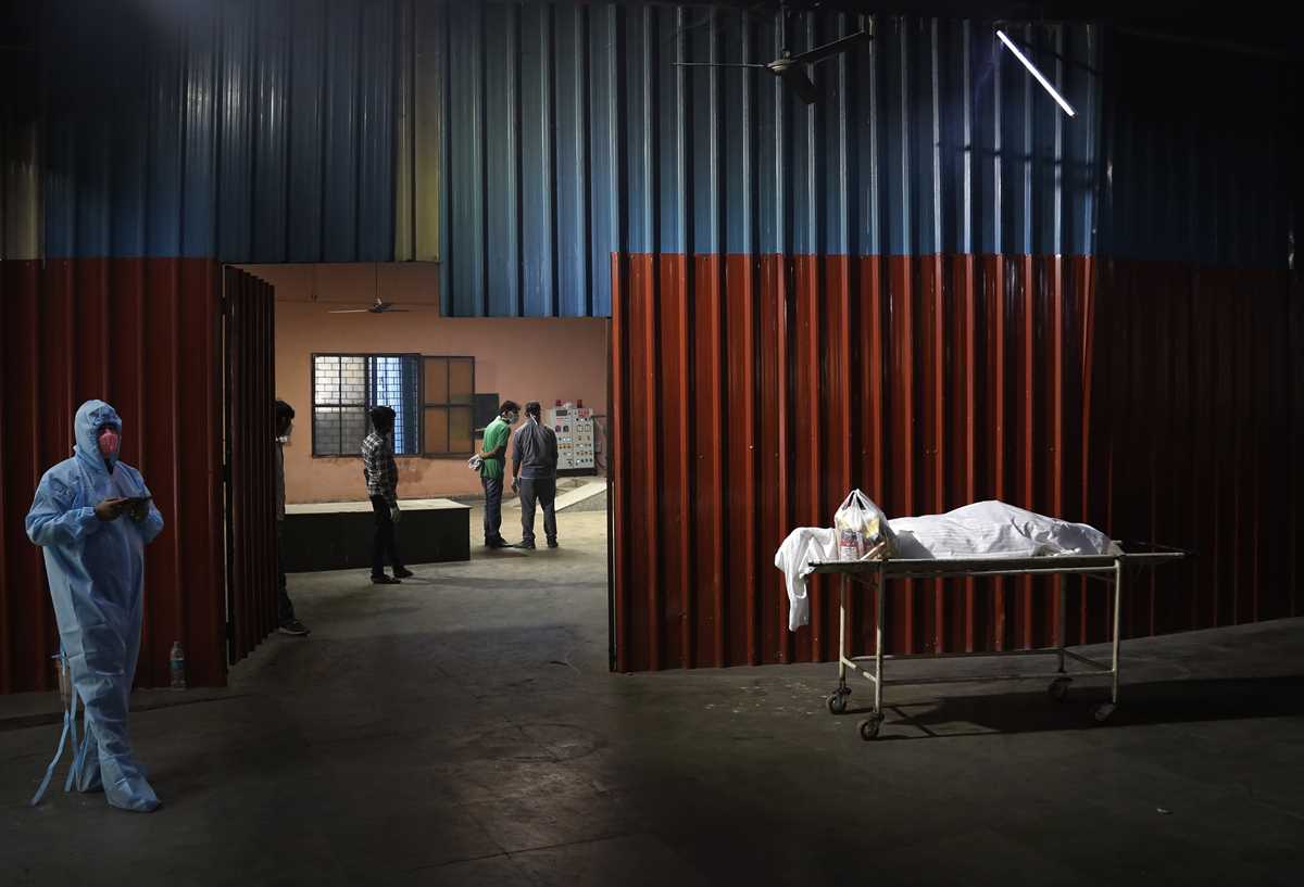 The Latest: Vaccine production halts at Baltimore factory